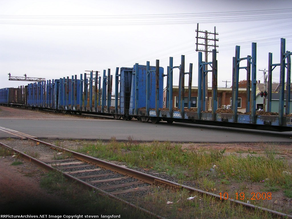 Empty Pulpwood Cars Crossing Baldwin Ave.